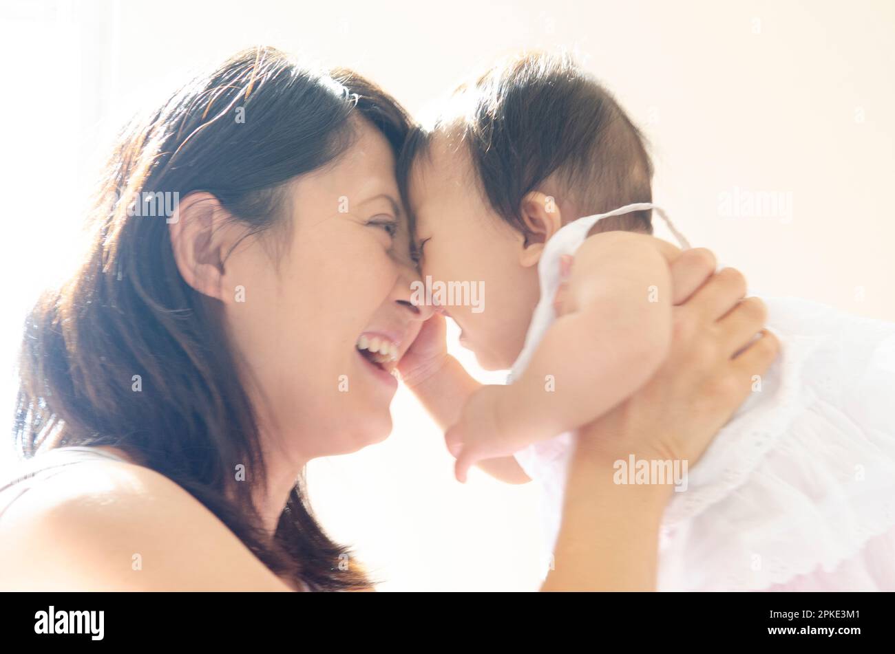 Mother nursing her baby Stock Photo - Alamy