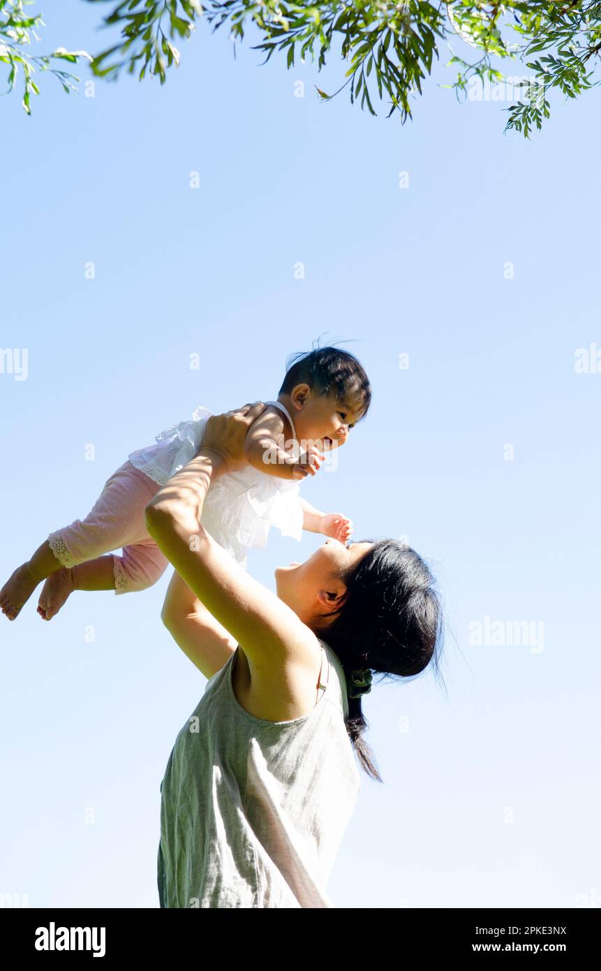 Mother nursing her baby Stock Photo - Alamy
