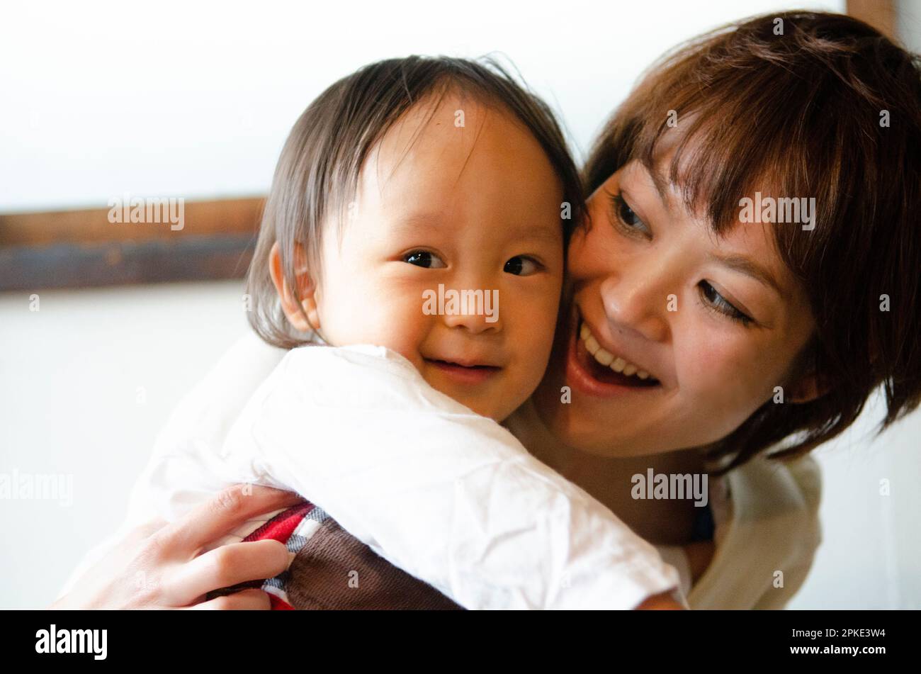 Parent and child playing Stock Photo - Alamy