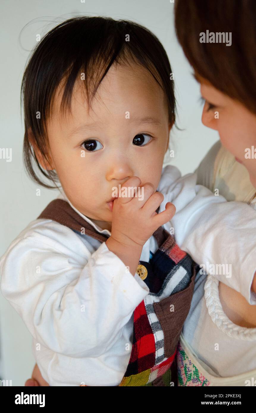 Female child being carried hi-res stock photography and images - Alamy