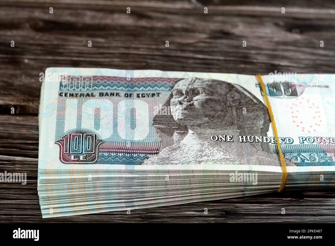 Stack of Egyptian currency of 100 EGP LE one hundred Egyptian pound ...