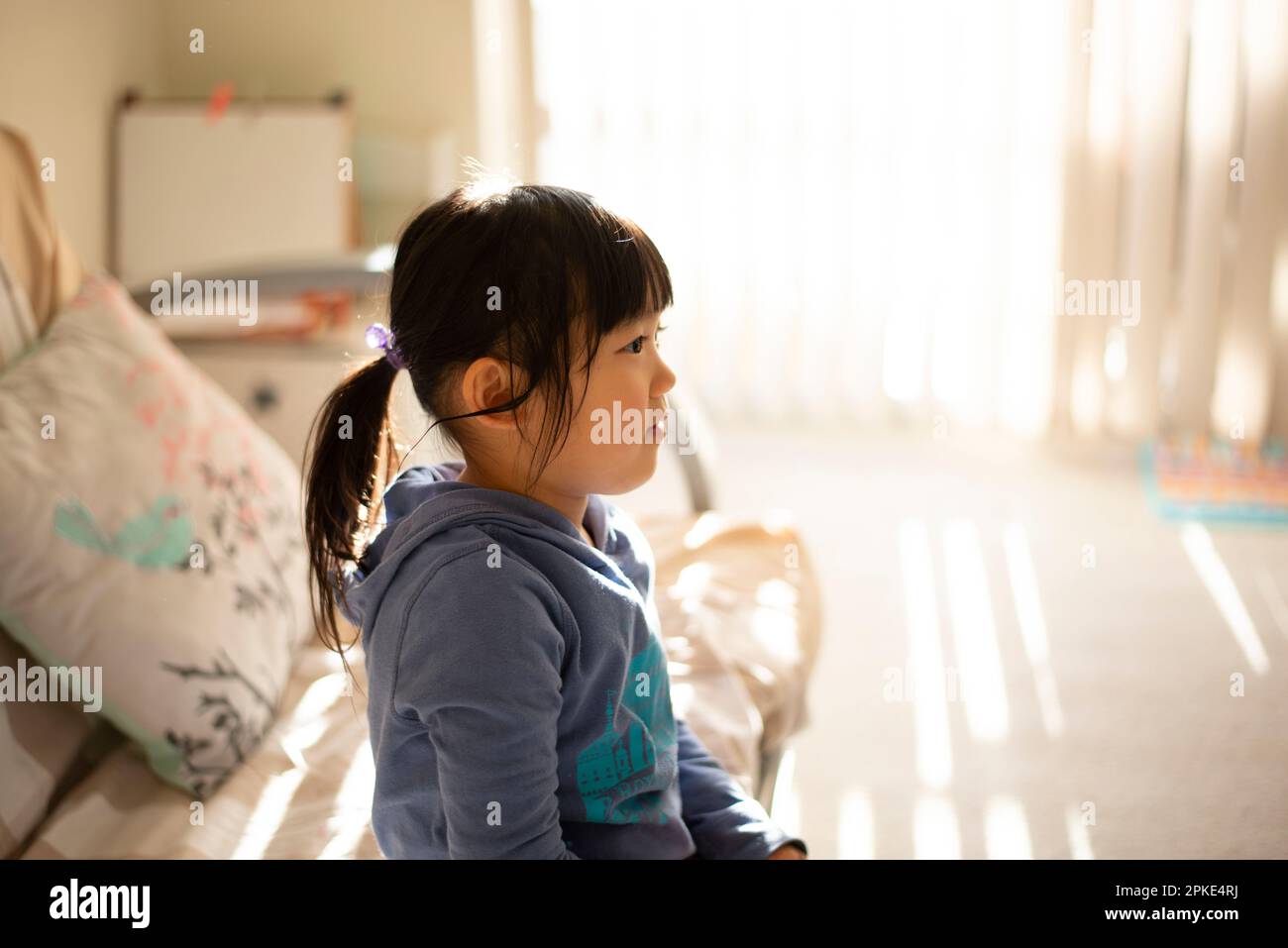 Girl alone in the house Stock Photo - Alamy
