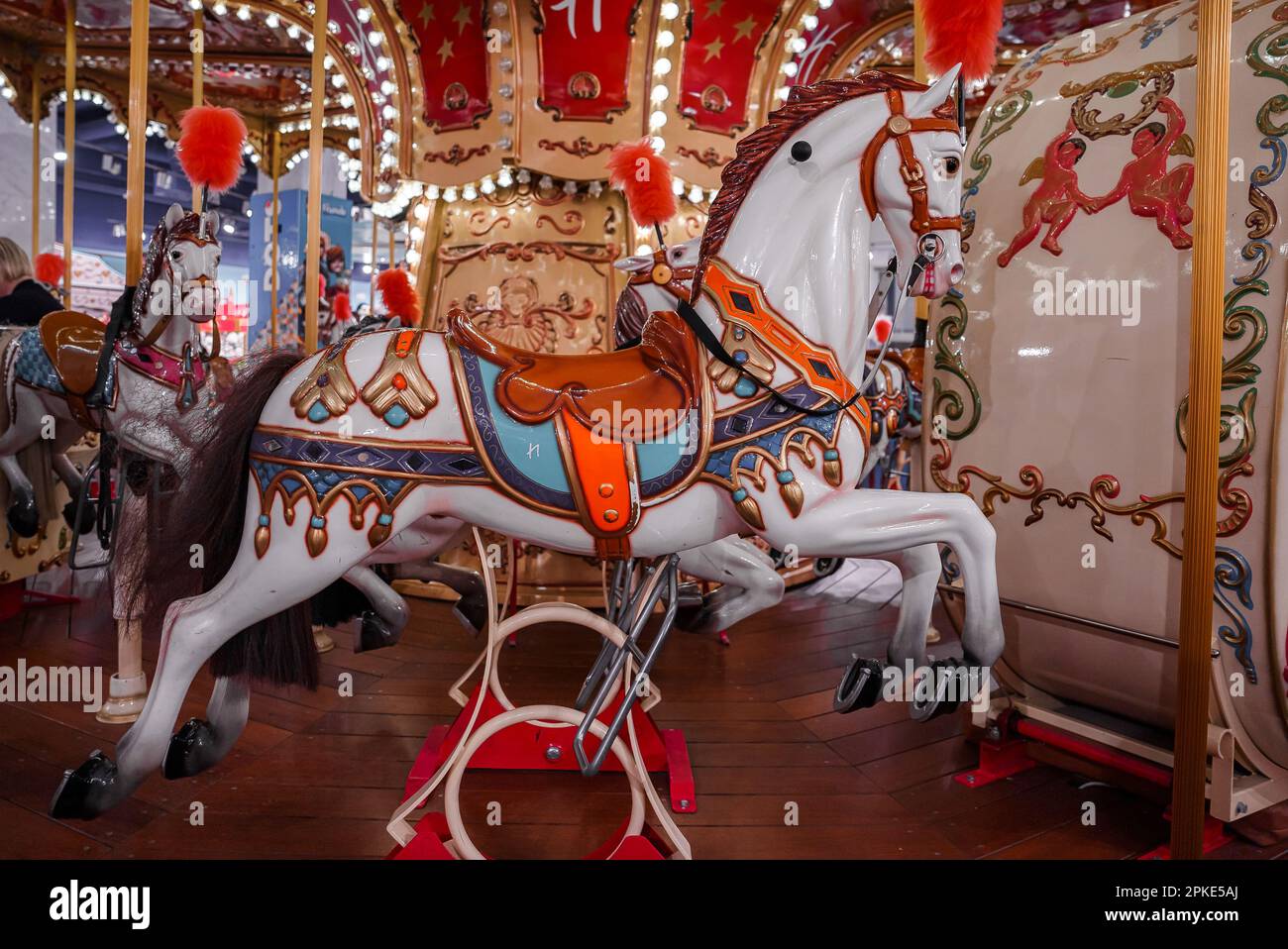 Old French carousel in a holiday park Stock Photo - Alamy