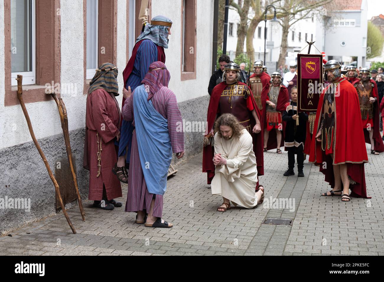 Bensheim, Germany. 07th Apr, 2023. Jesus (Julian Lux) kneels before the ...