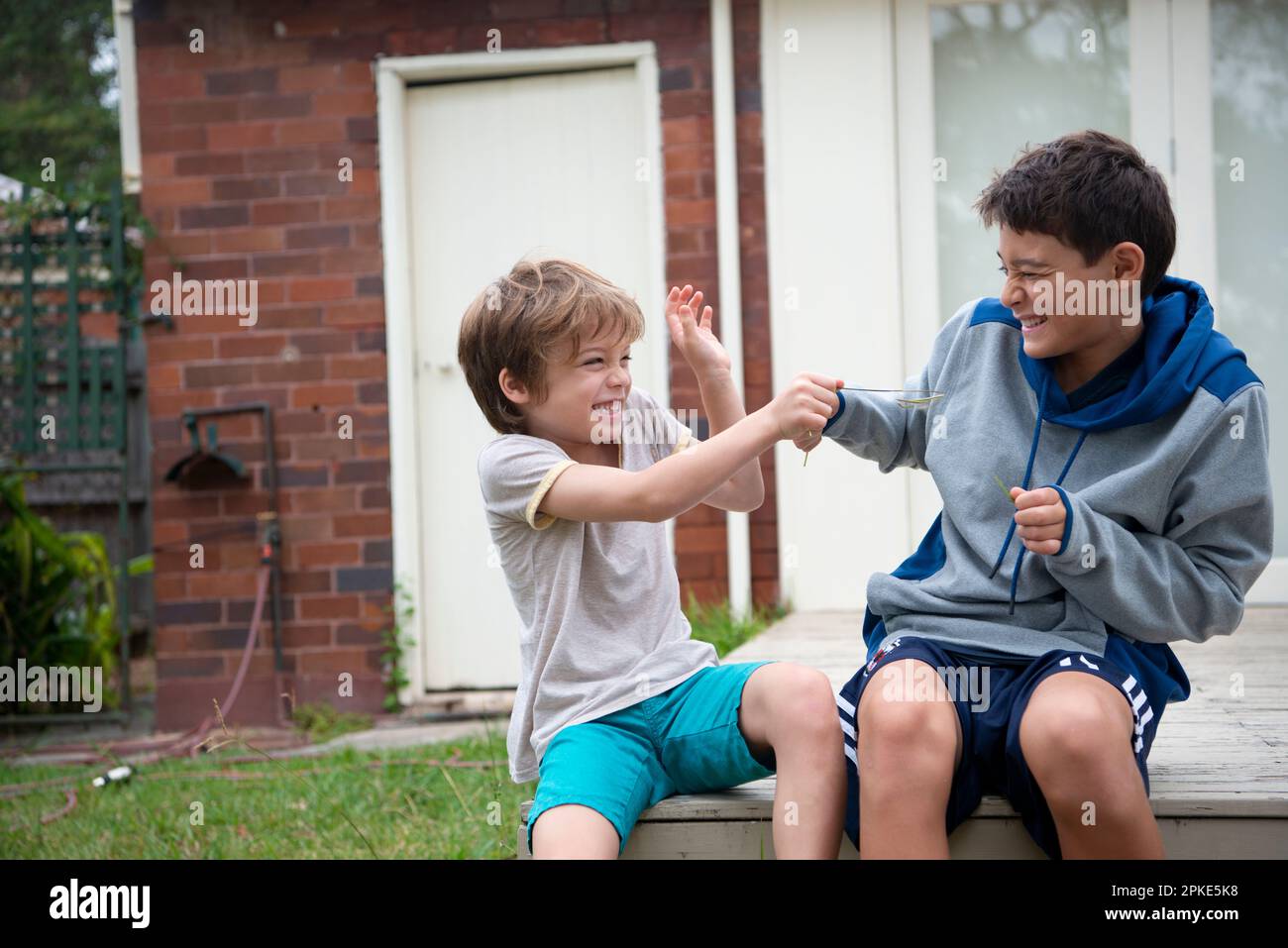 Laughing brothers hi-res stock photography and images - Alamy