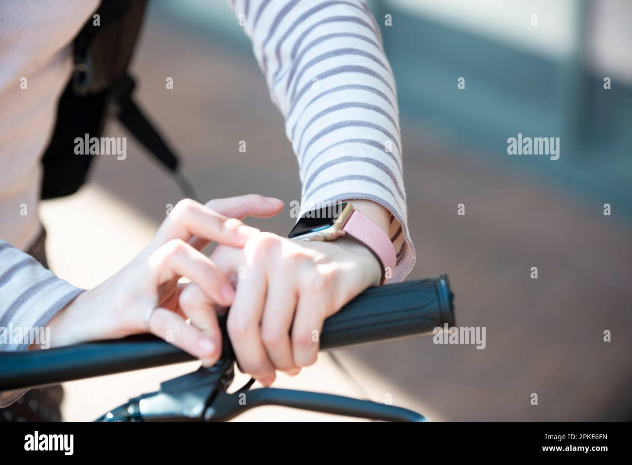 Woman's hand touching smartwatch Stock Photo - Alamy