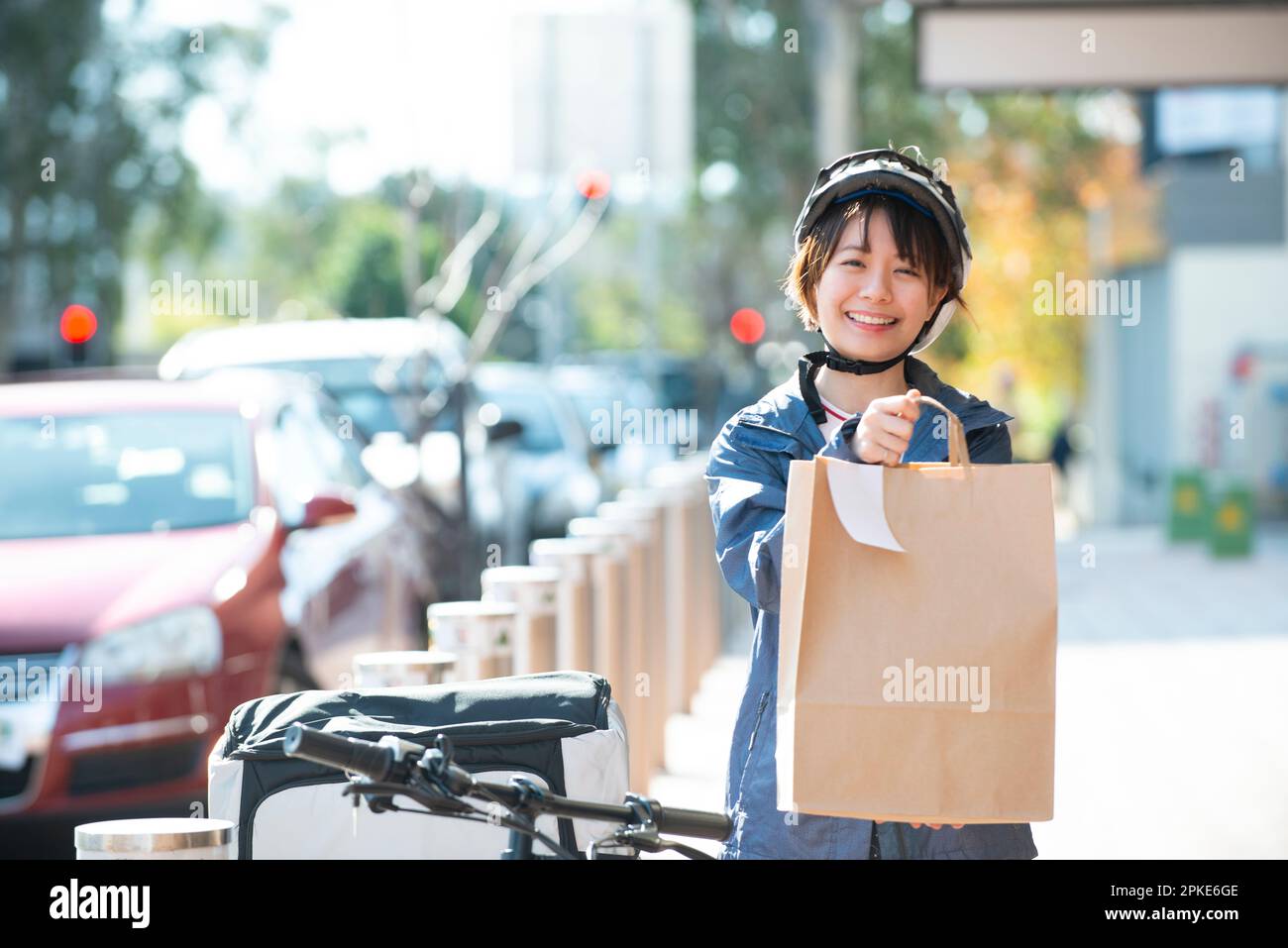 Woman holding work bag hi-res stock photography and images - Alamy