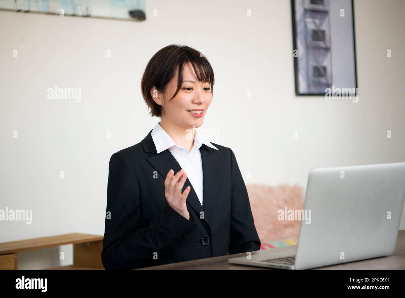 Woman talking online interview indoors hi-res stock photography and ...