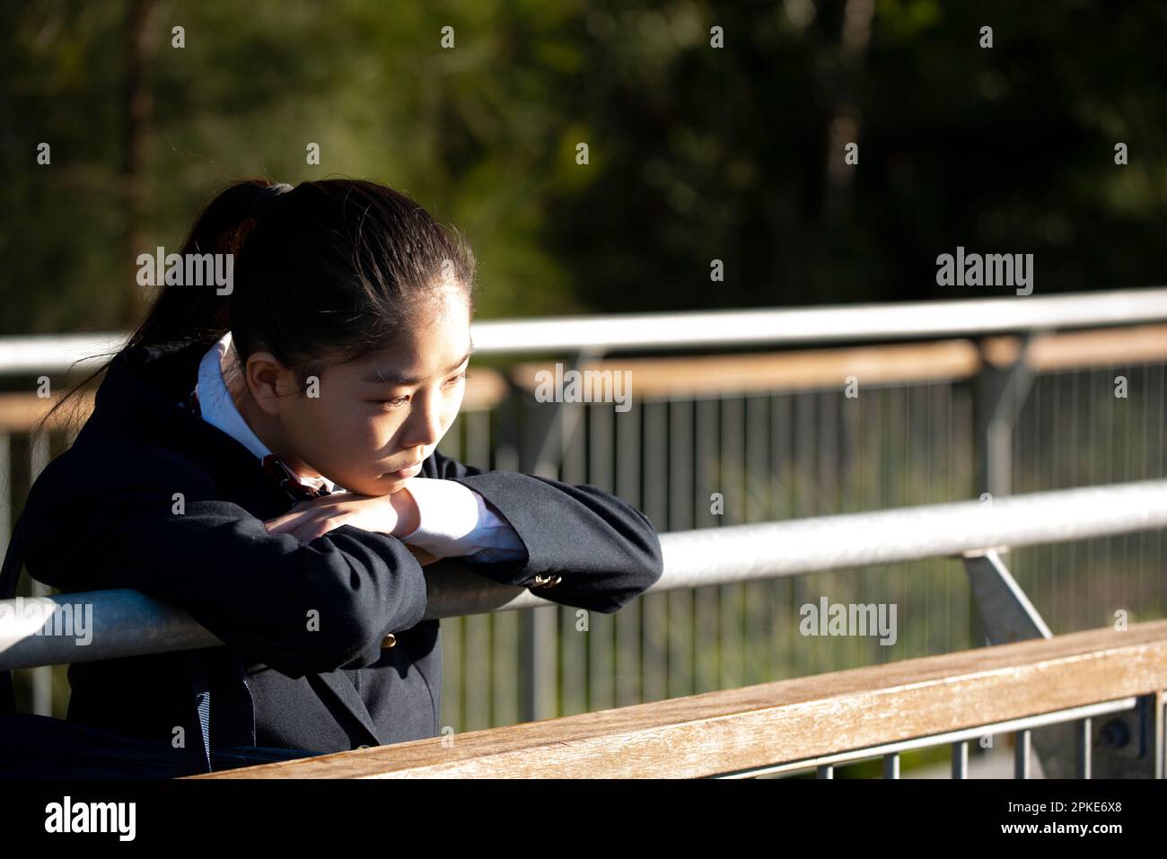 Female student in school uniform in distress Stock Photo - Alamy