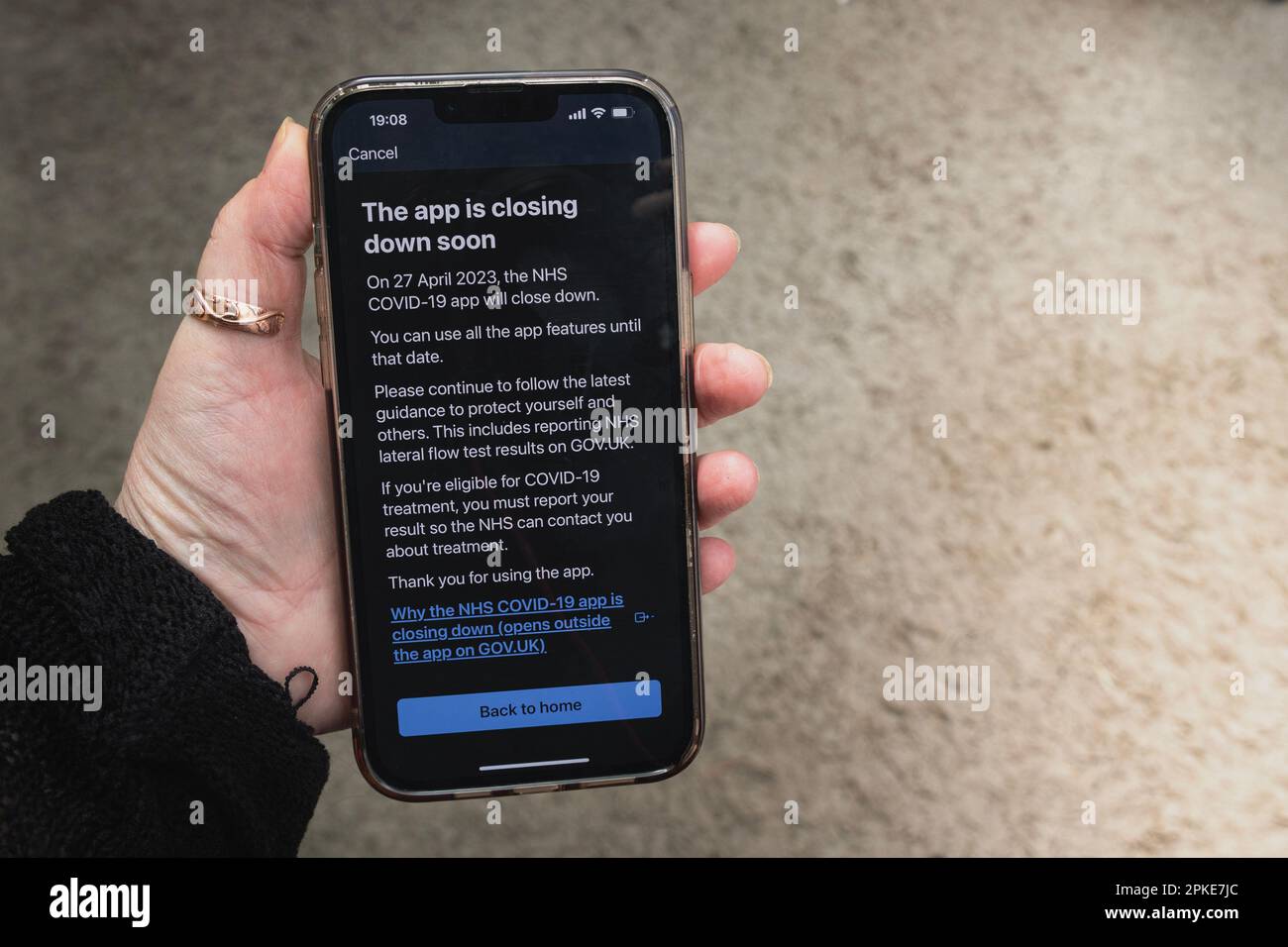 notification on an iPhone 13 regarding the closing of the NHS covid-19 ...