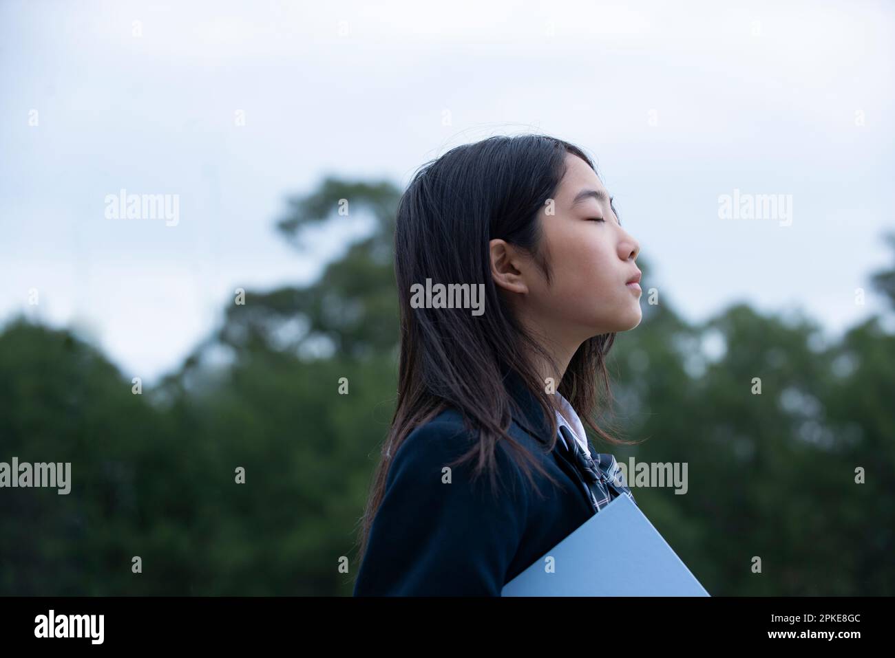 School girl profile school uniform hi-res stock photography and images ...