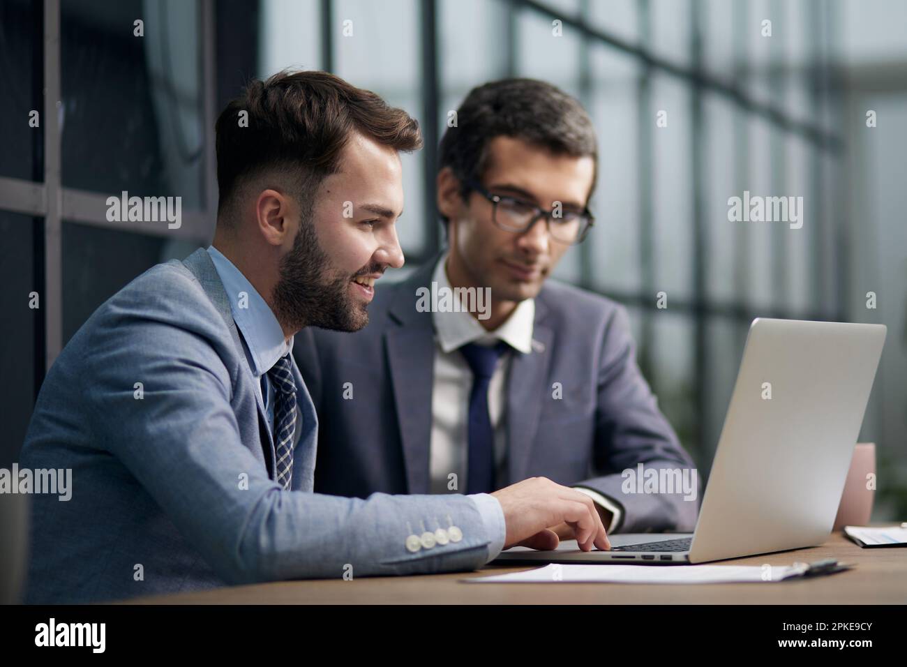 Indian businessmen working on project hi-res stock photography and ...