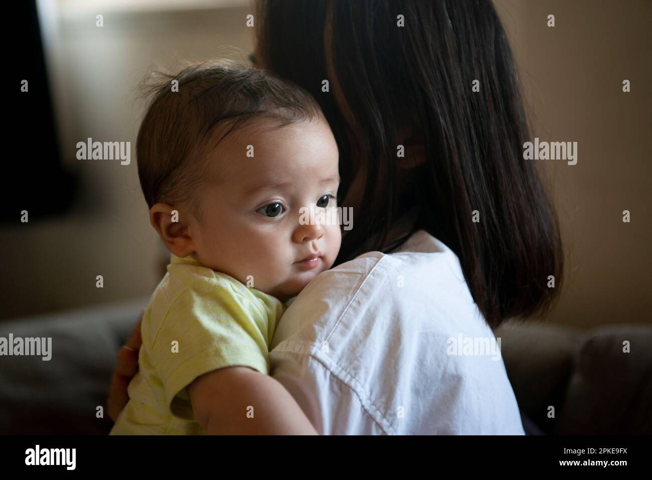 Happy baby being held hi-res stock photography and images - Alamy