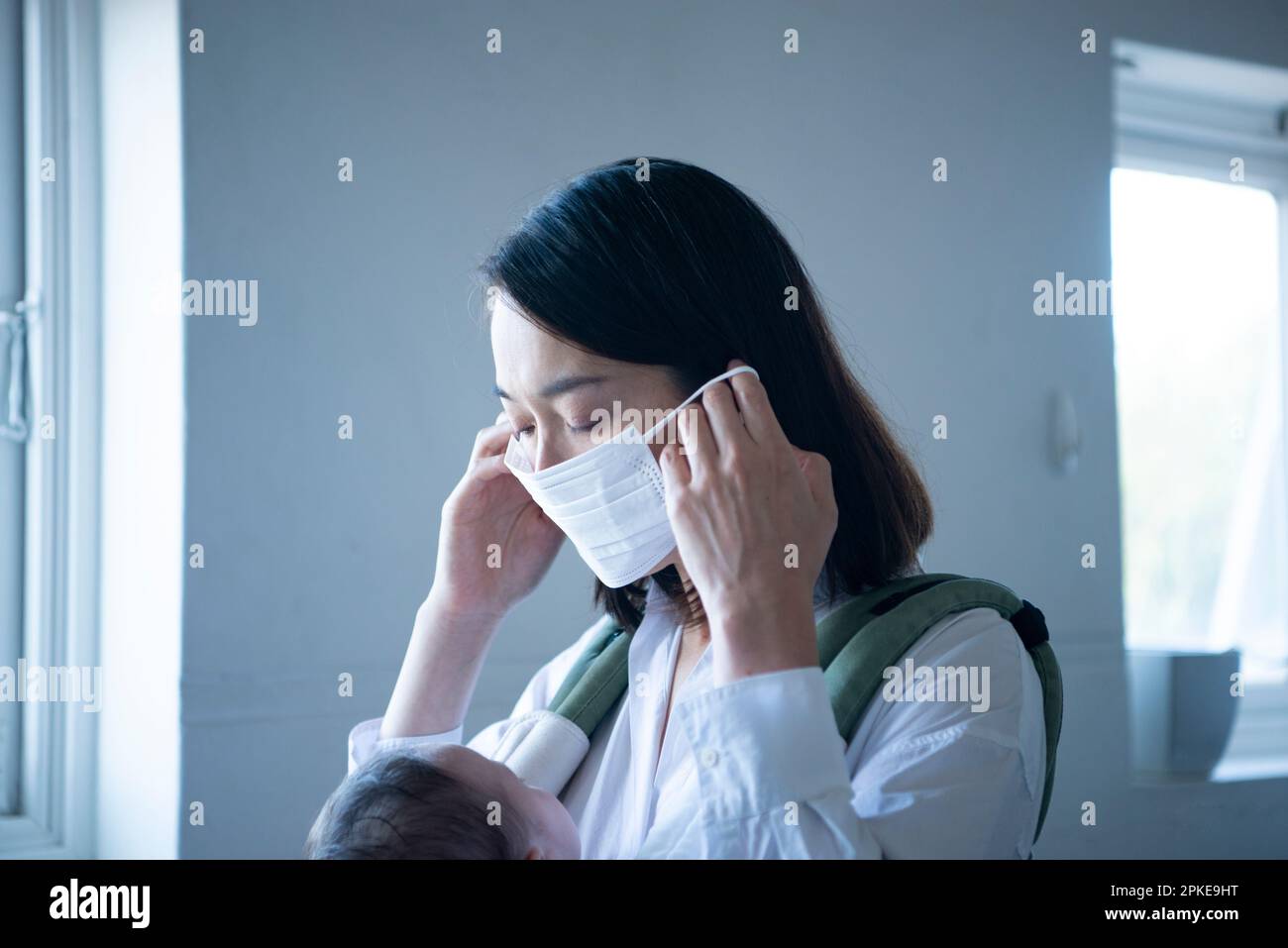Japanese woman carrying baby on hi-res stock photography and images - Alamy