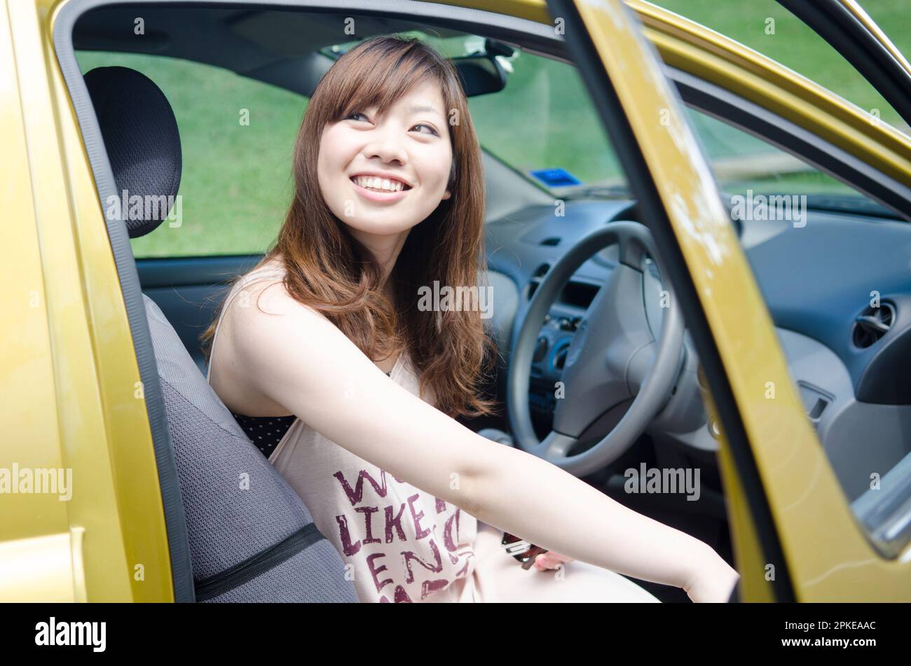 Woman driving open car hi-res stock photography and images - Alamy