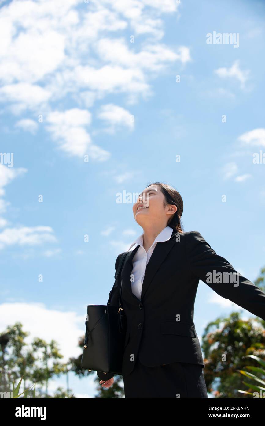 Woman taking deep breath hi-res stock photography and images - Alamy