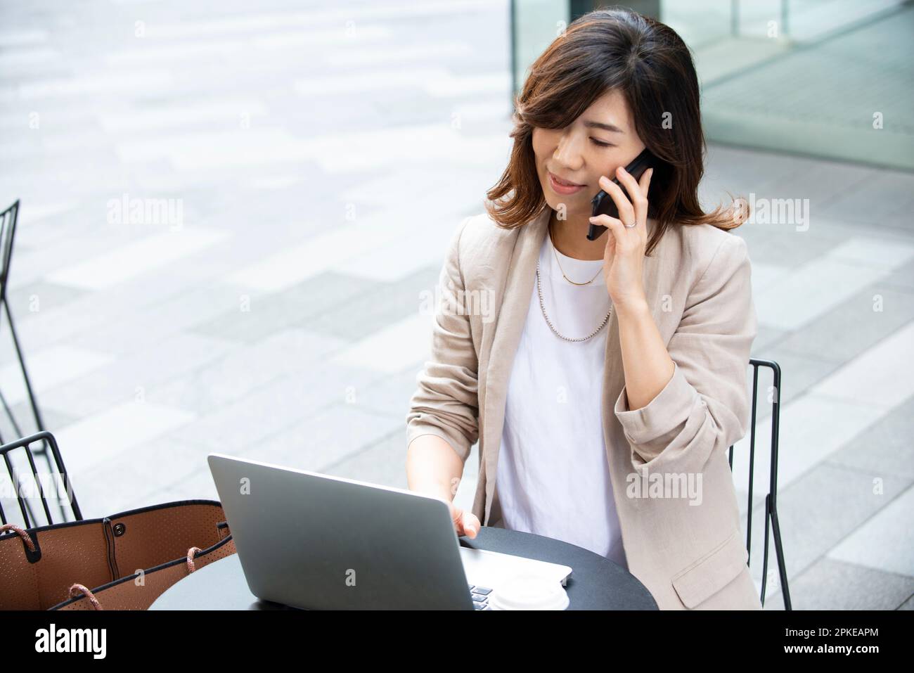 Phone call open laptop work hi-res stock photography and images - Alamy