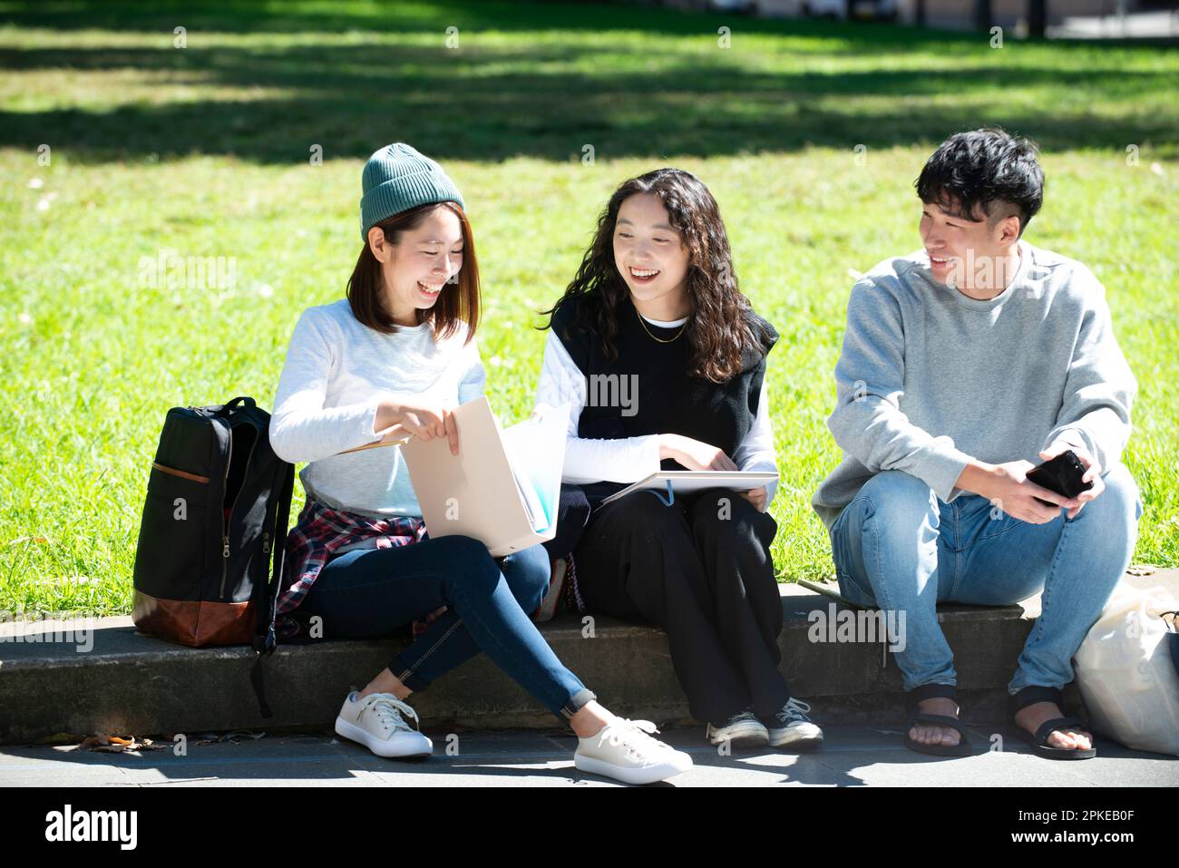 Male student studying outside hi-res stock photography and images - Alamy