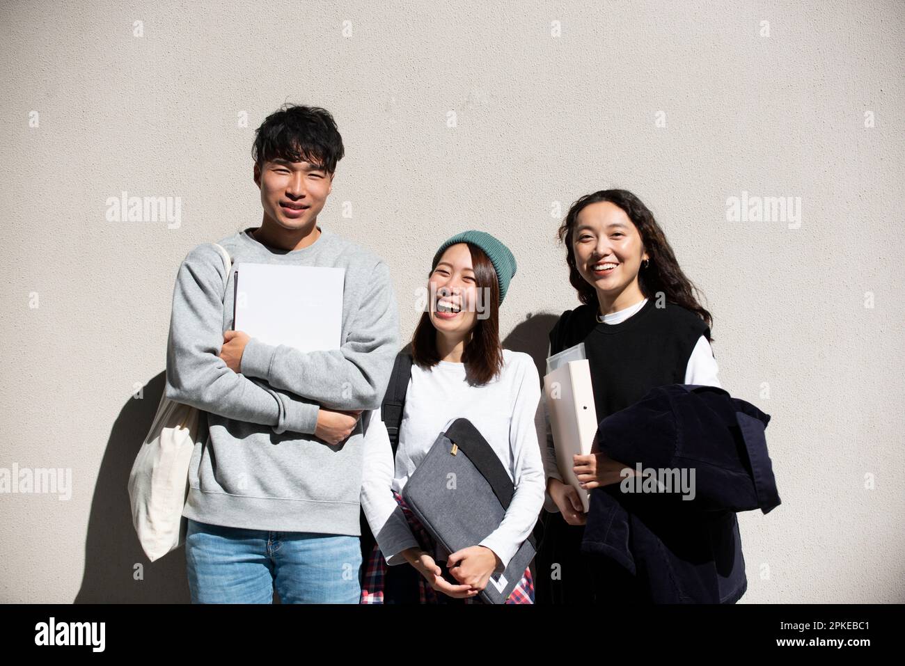 Group three college students hi-res stock photography and images - Alamy