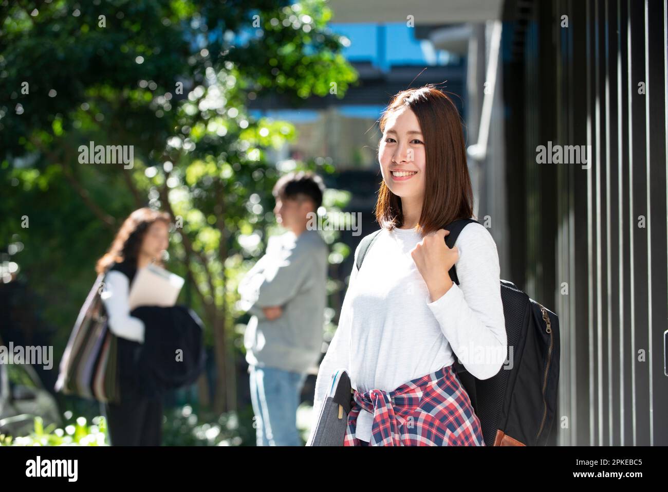 Cheerful asian female student hi-res stock photography and images - Alamy