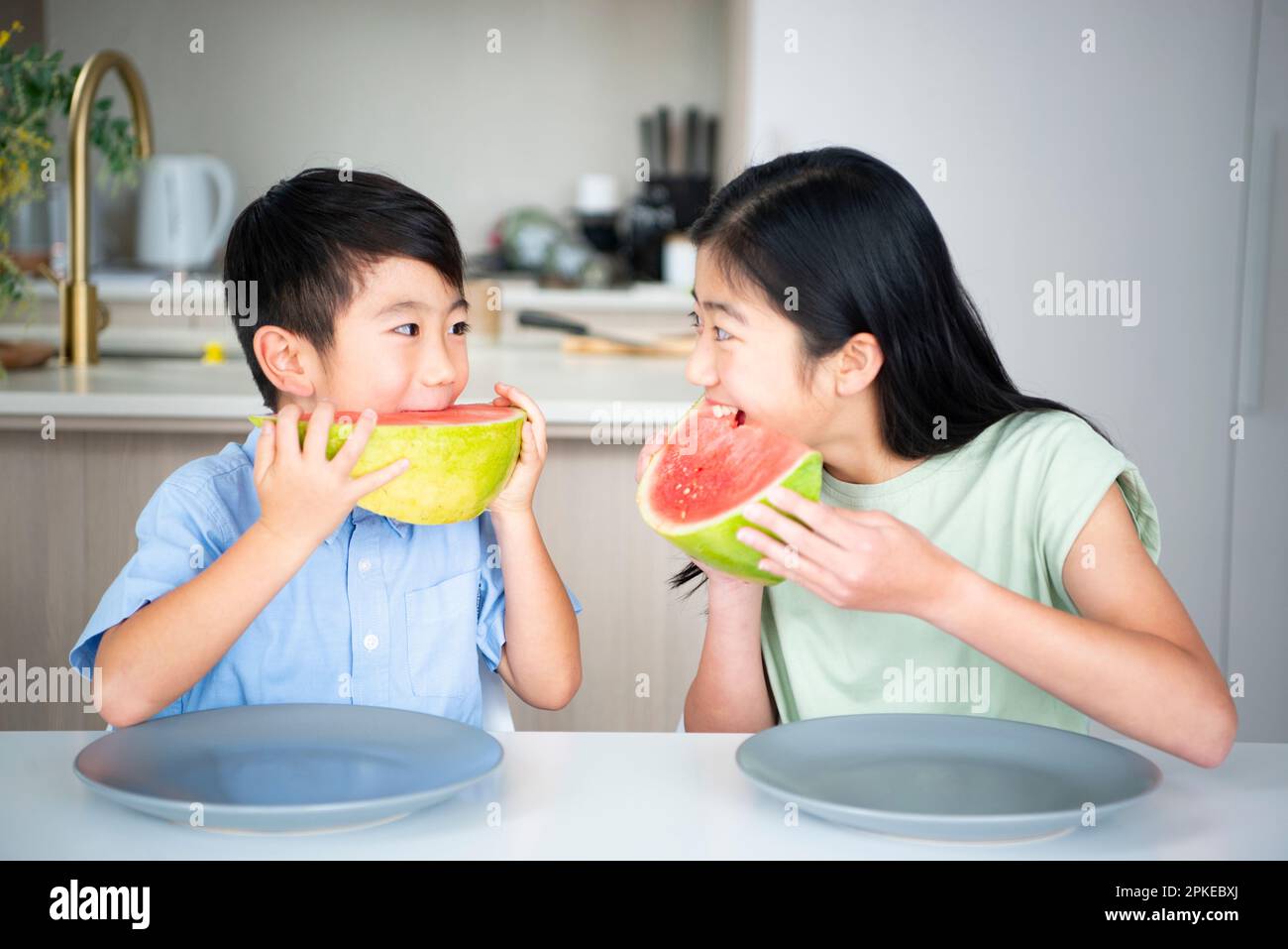 Older sister and two younger brothers hi-res stock photography and ...