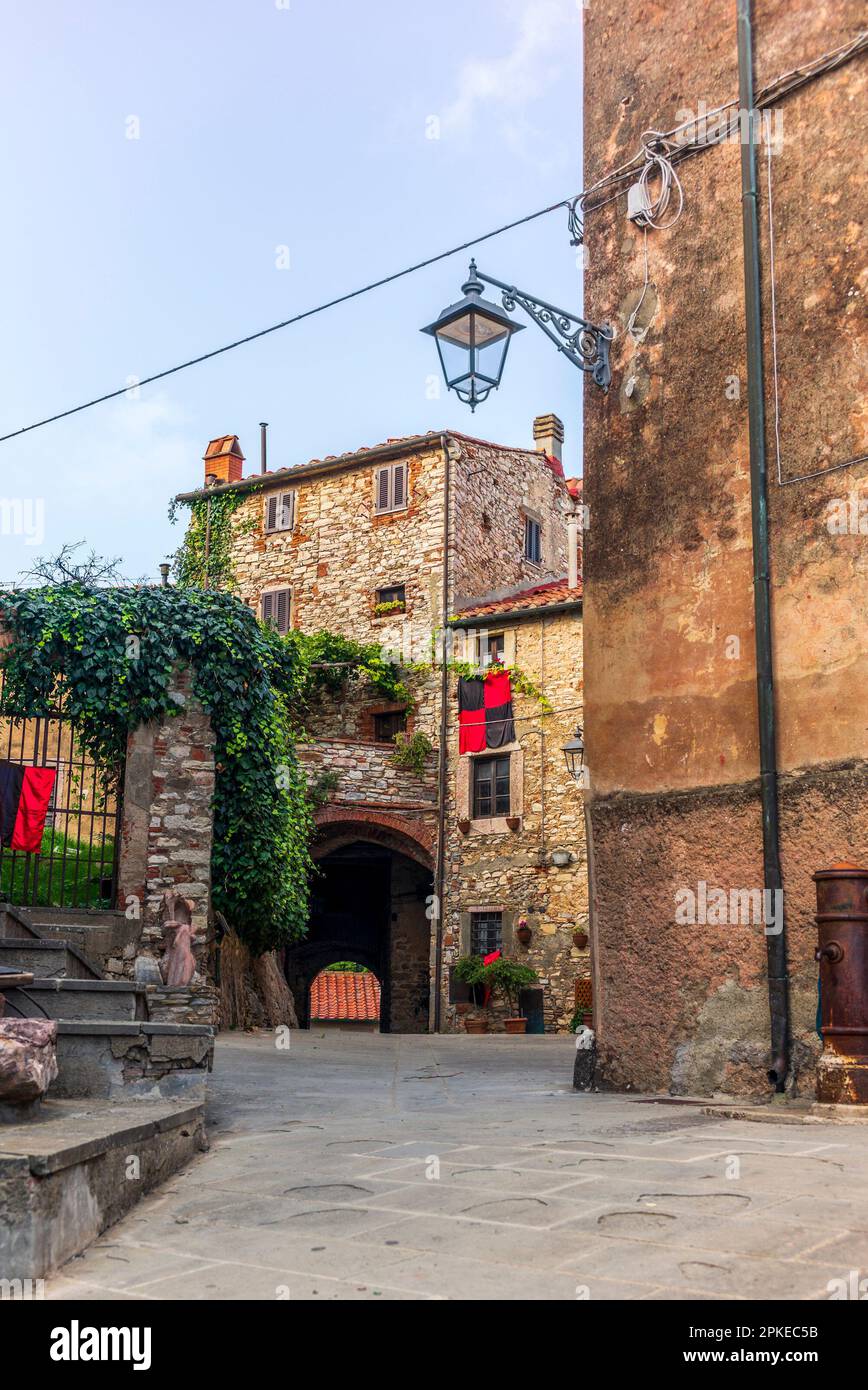 Narrow streets and alleys in the medieval town of Sassetta Stock Photo ...