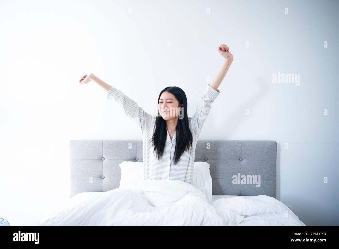 Stretch woman bed hi-res stock photography and images - Alamy