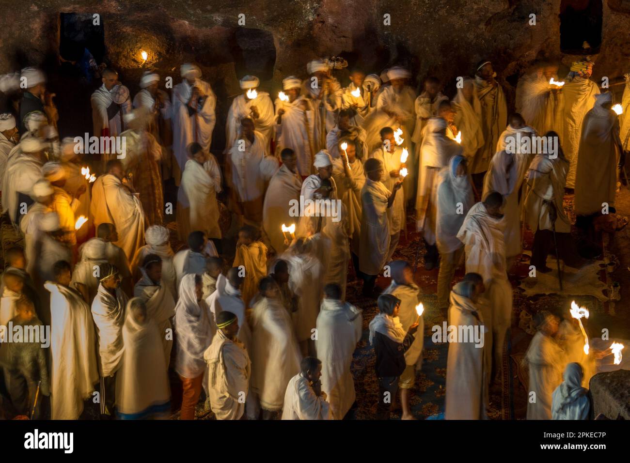 Pilgrims outside the rock hewn temple of Bete Giyorgis in Lalibela ...
