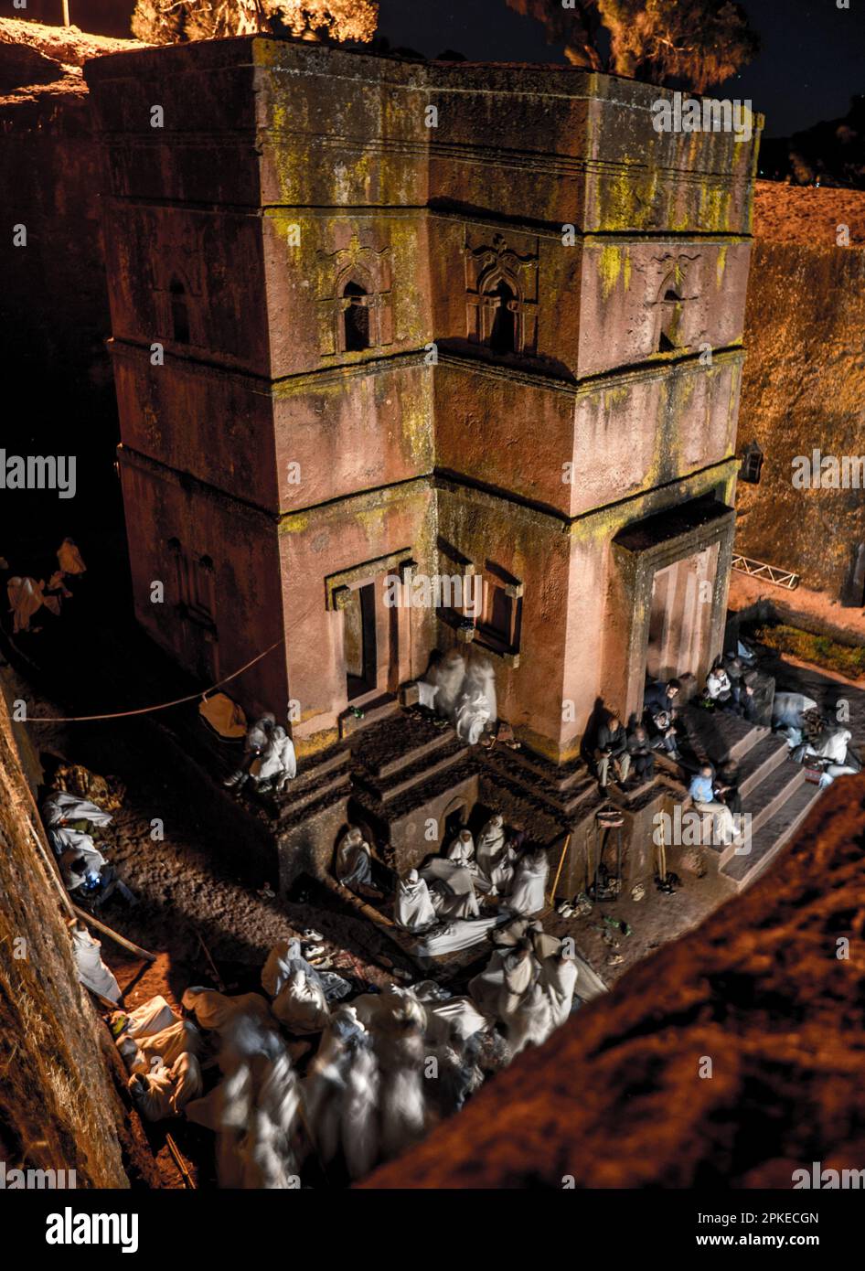 Pilgrims outside the rock hewn temple of Bete Giyorgis in Lalibela ...