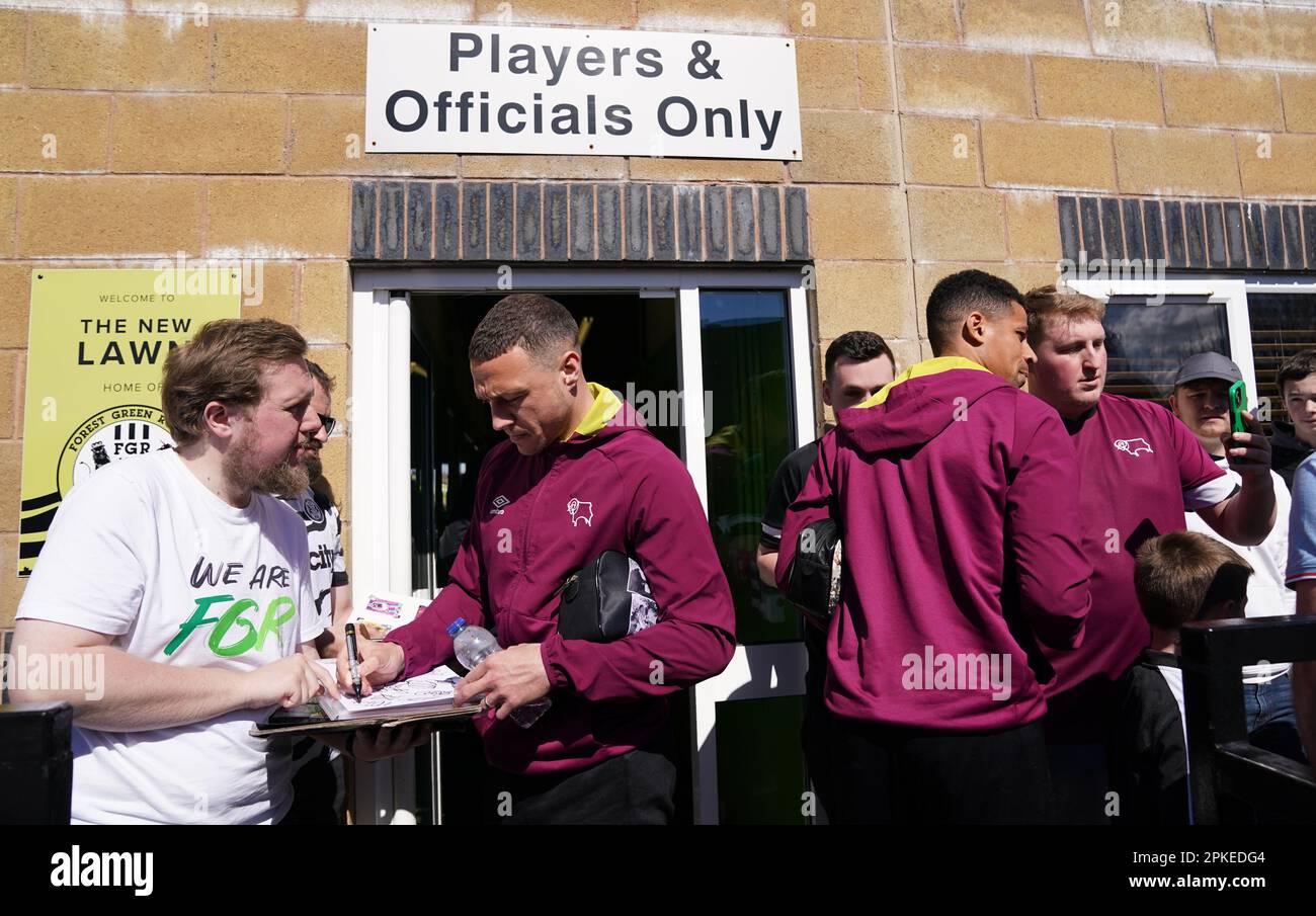Derby County's James Chester (left) and Curtis Davies meet fans before ...