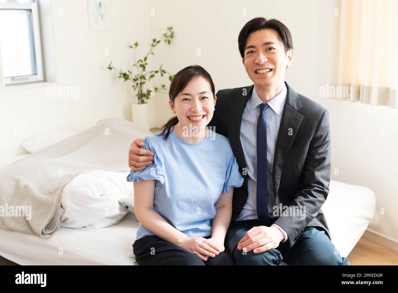 Asian couple bed hi-res stock photography and images - Alamy