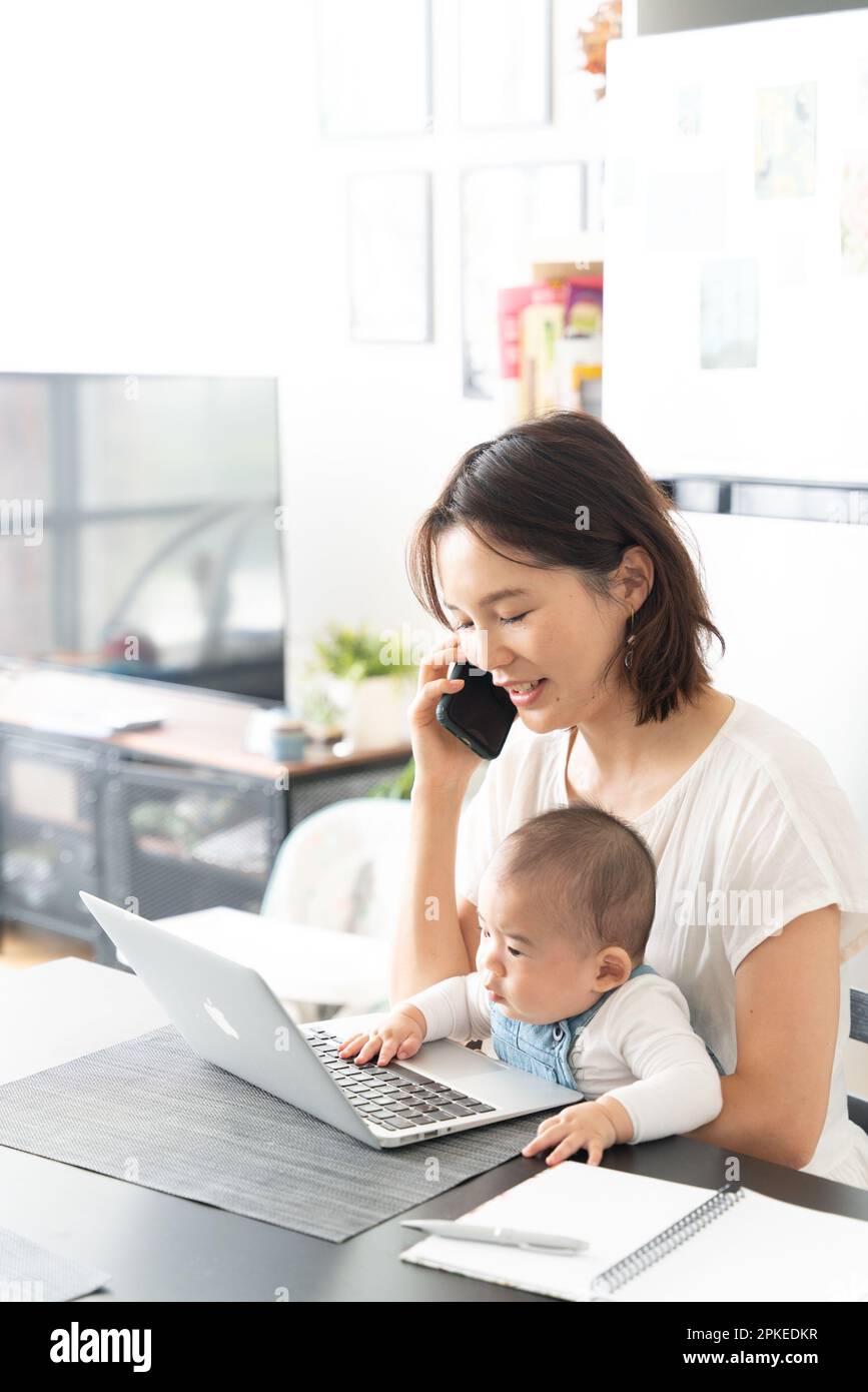 Asian woman talking to child hi-res stock photography and images - Alamy