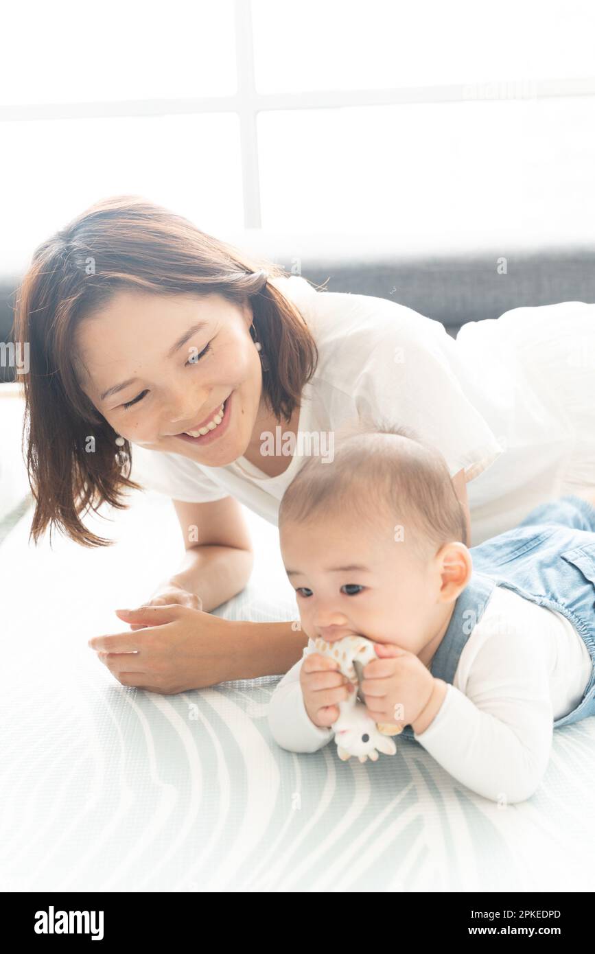 Mother baby teether hi-res stock photography and images - Alamy