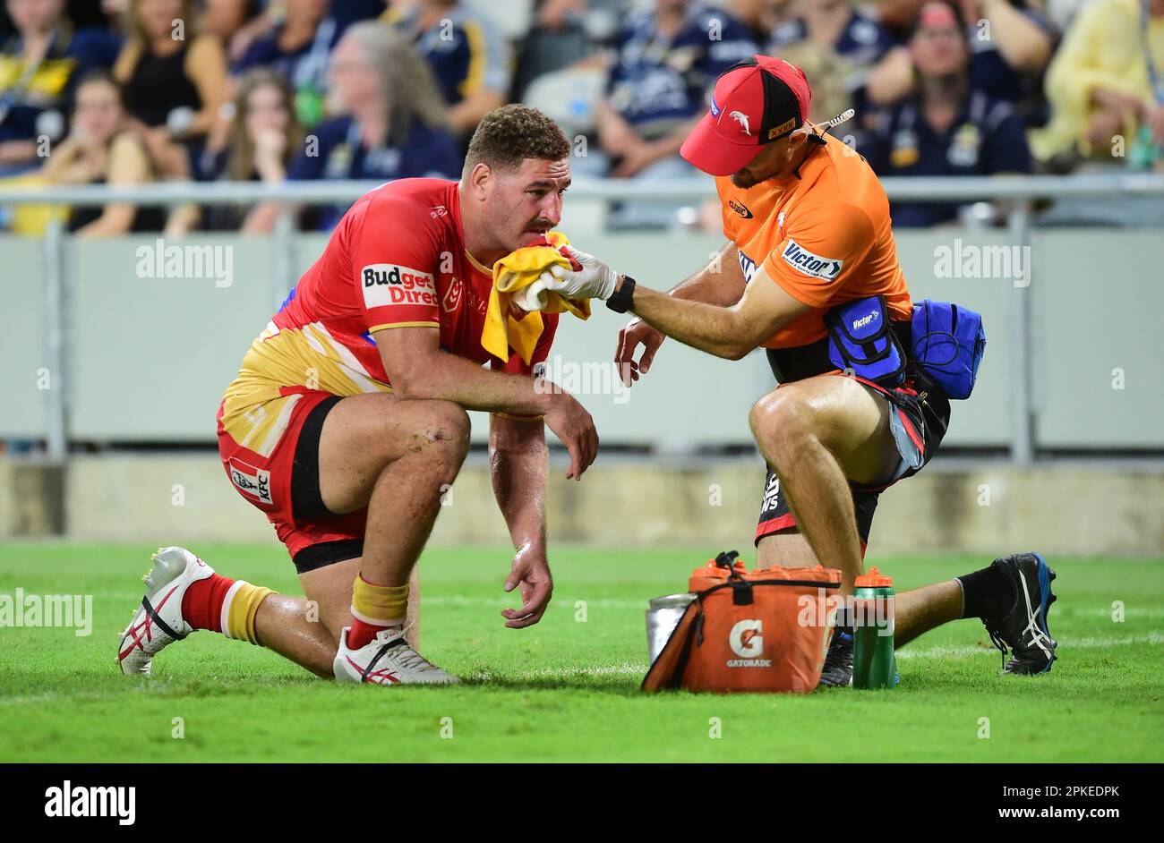 Brenko Lee of the Dolphins receiving attention during the NRL Round 6 ...