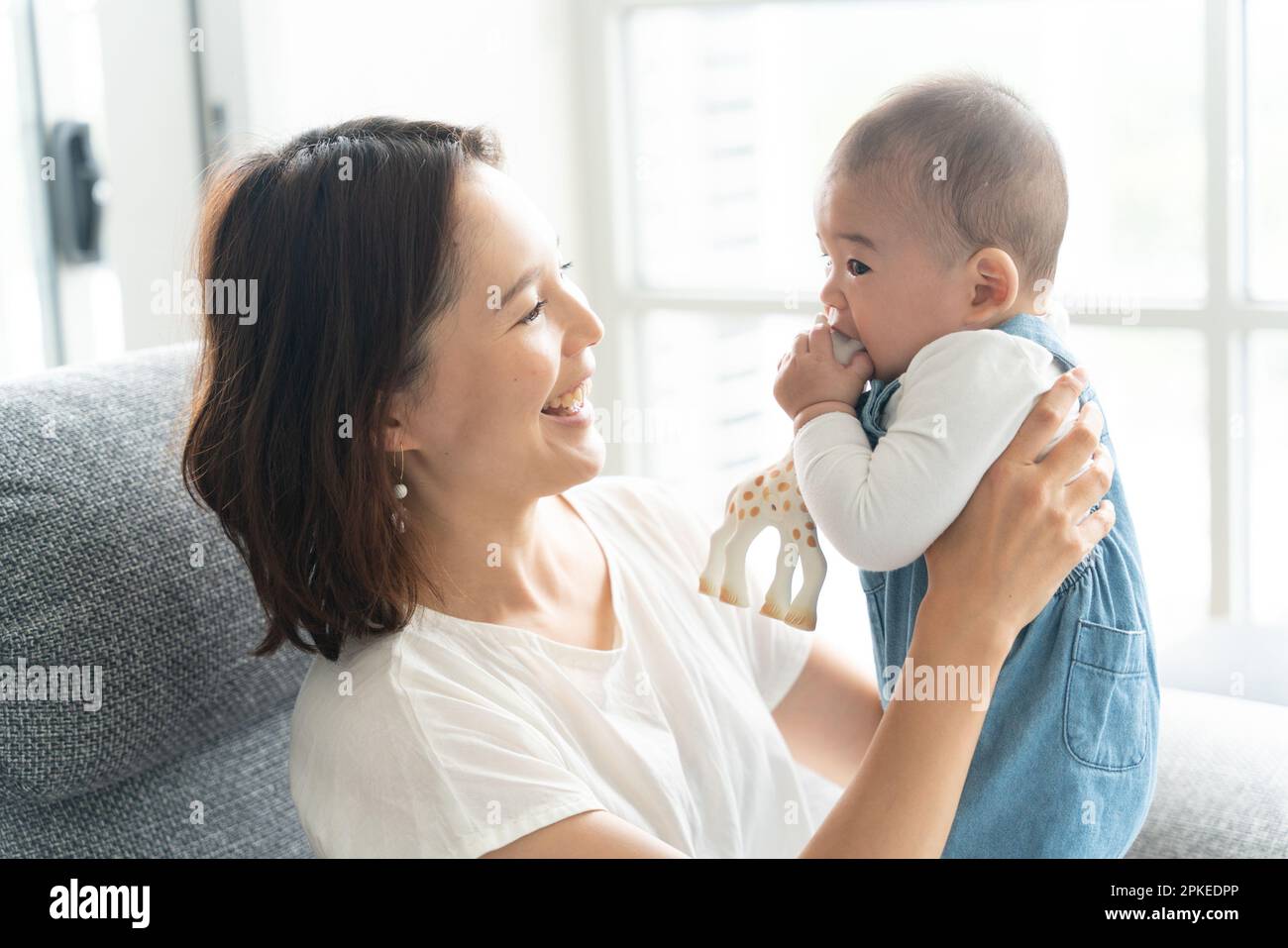 Mother nursing her baby Stock Photo - Alamy