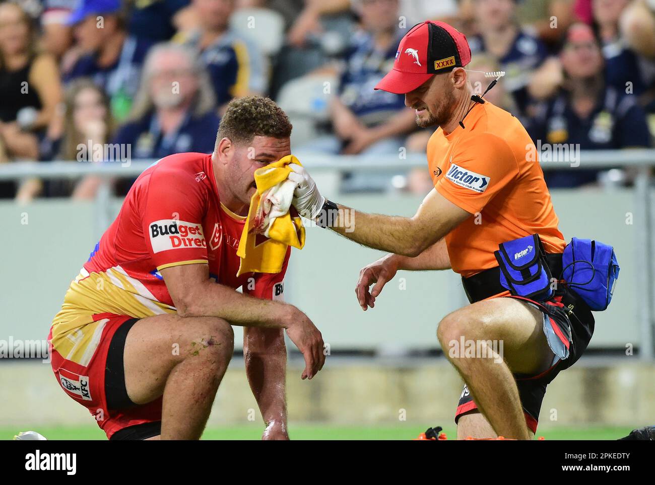 Brenko Lee of the Dolphins receiving attention during the NRL Round 6 ...