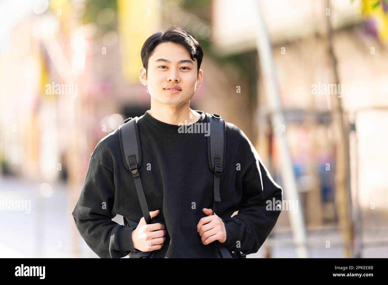 Man walking alone in the street Stock Photo - Alamy