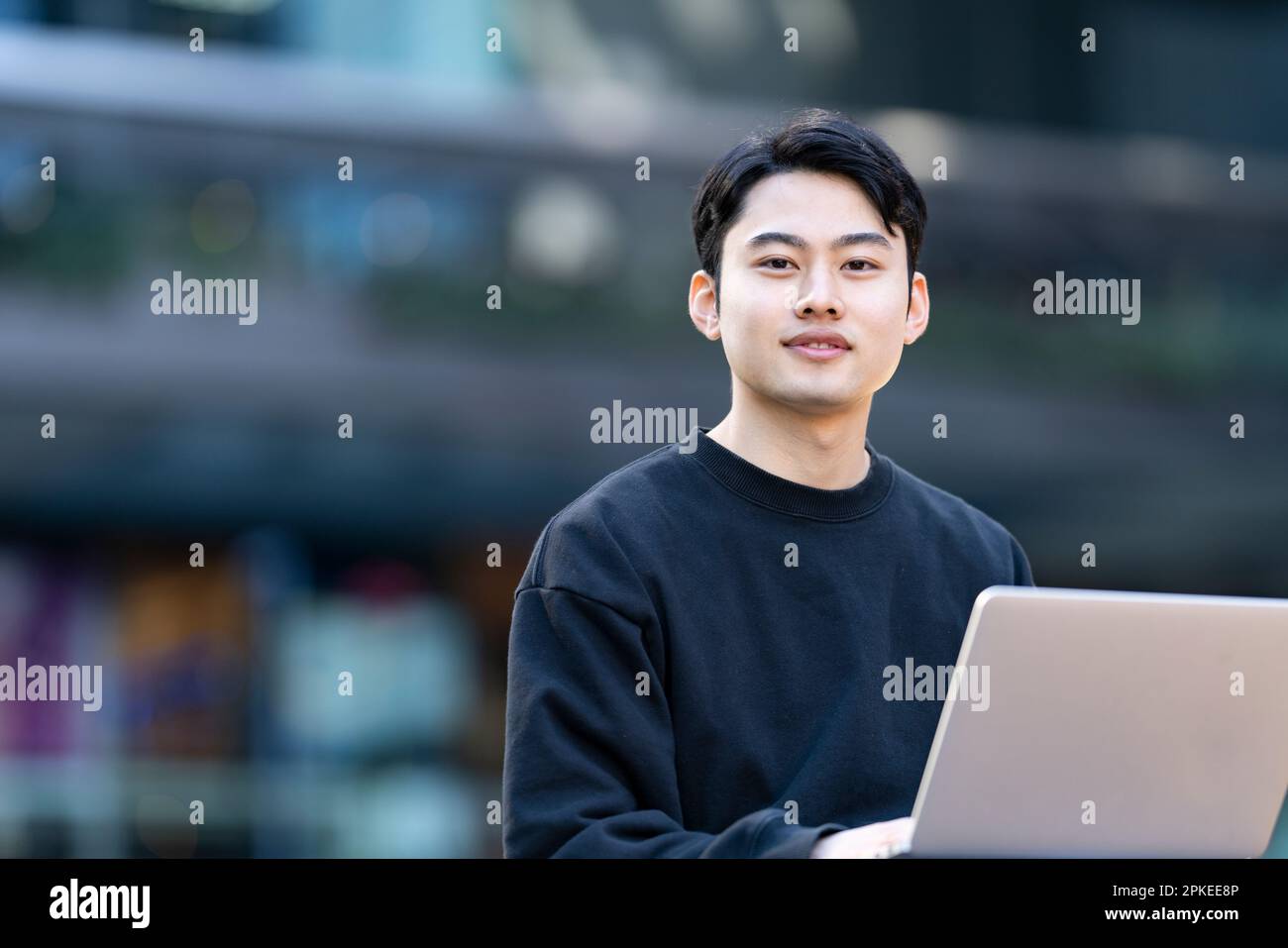 Working at computer outdoors hi-res stock photography and images - Alamy