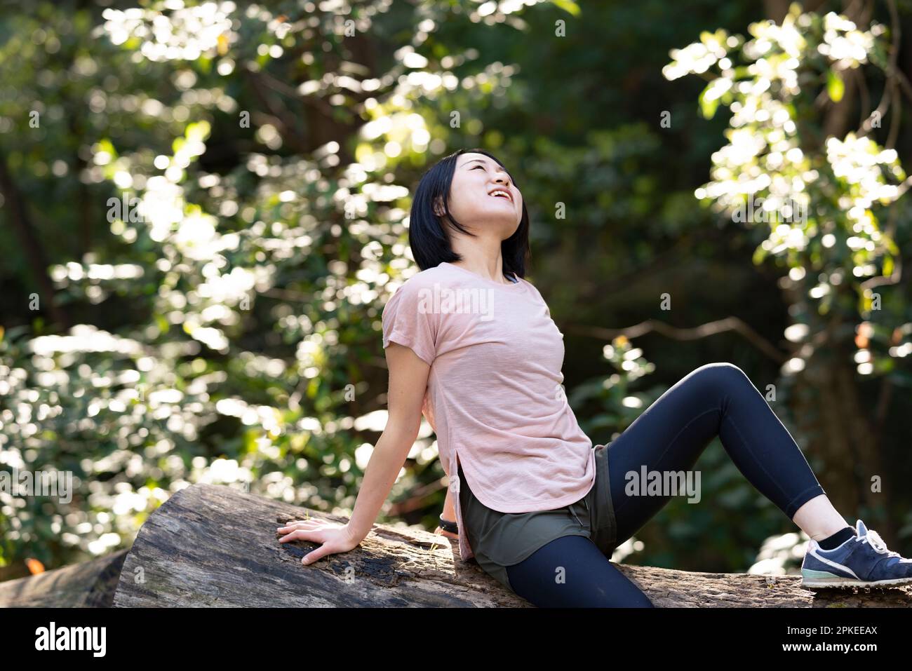 Woman taking a bath in the forest Stock Photo - Alamy