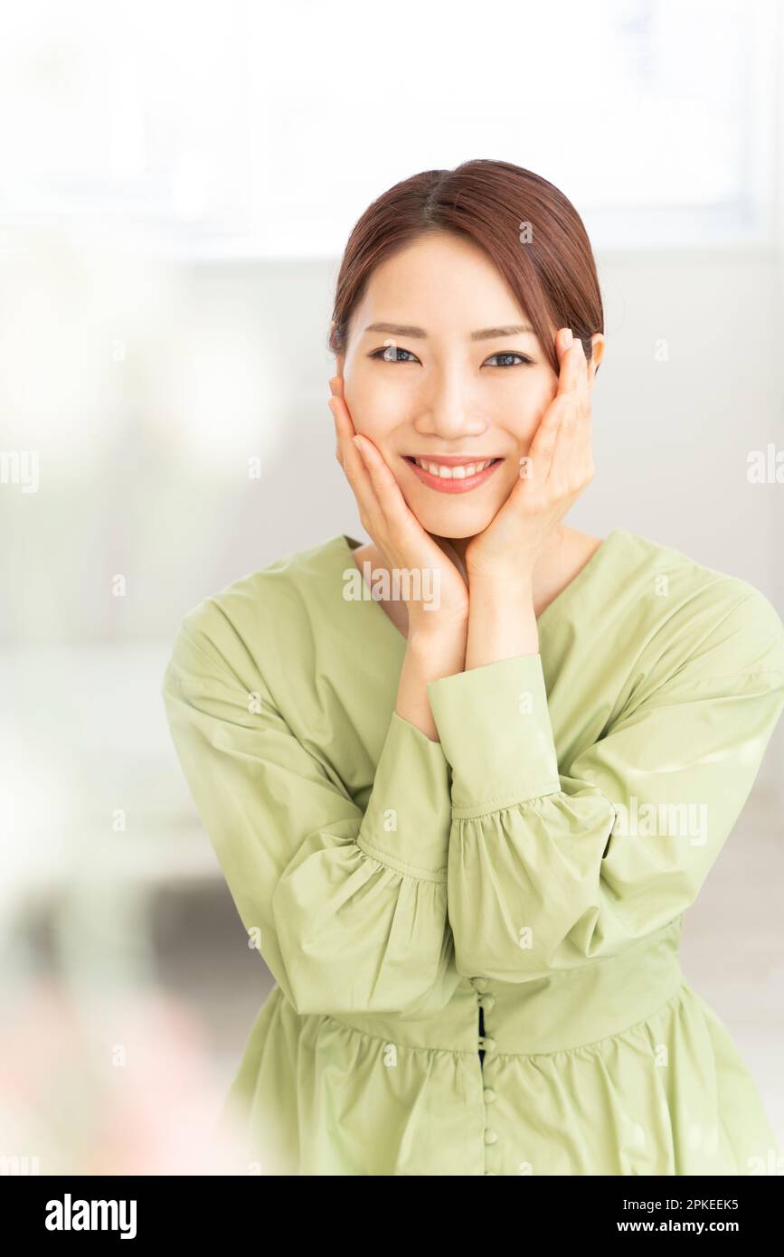 Hand on cheek hi-res stock photography and images - Alamy