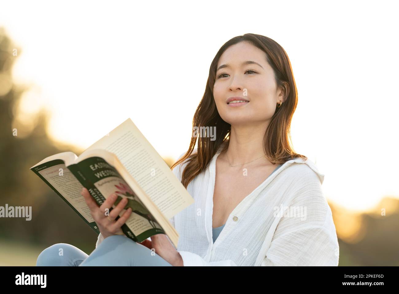 Reading outside hi-res stock photography and images - Alamy