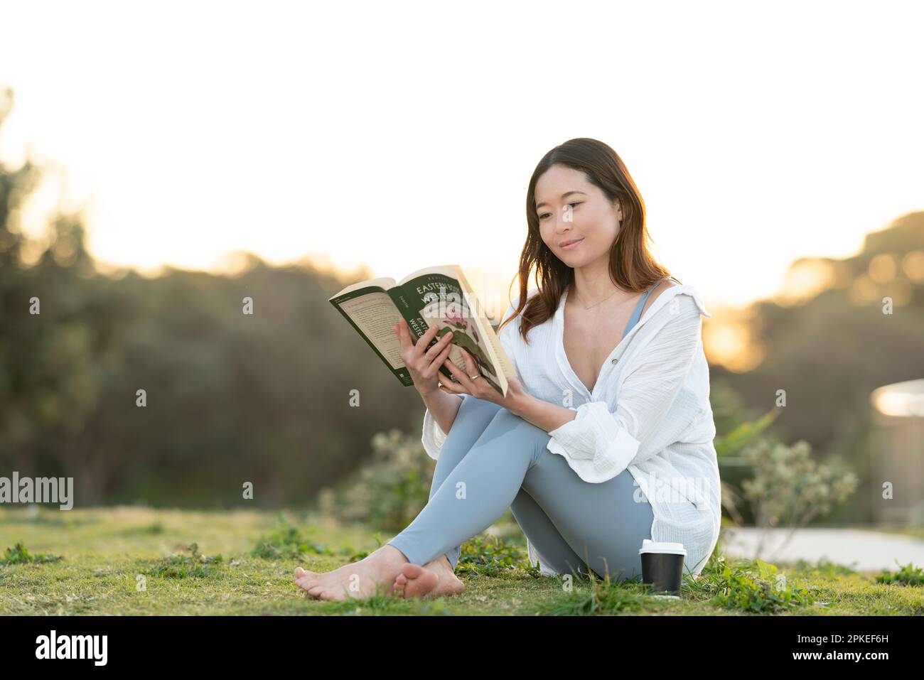 Reading outside hi-res stock photography and images - Alamy