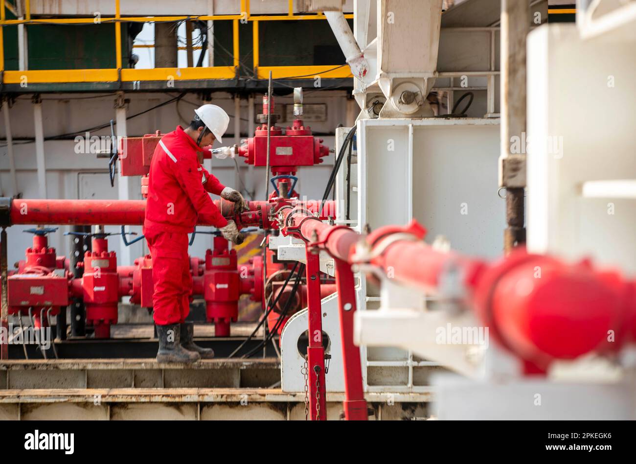 TAIZHOU, CHINA - APRIL 7, 2023 - Drillers work at a shale oil well site ...