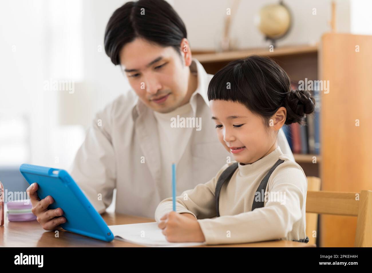 Father learning hi-res stock photography and images - Alamy