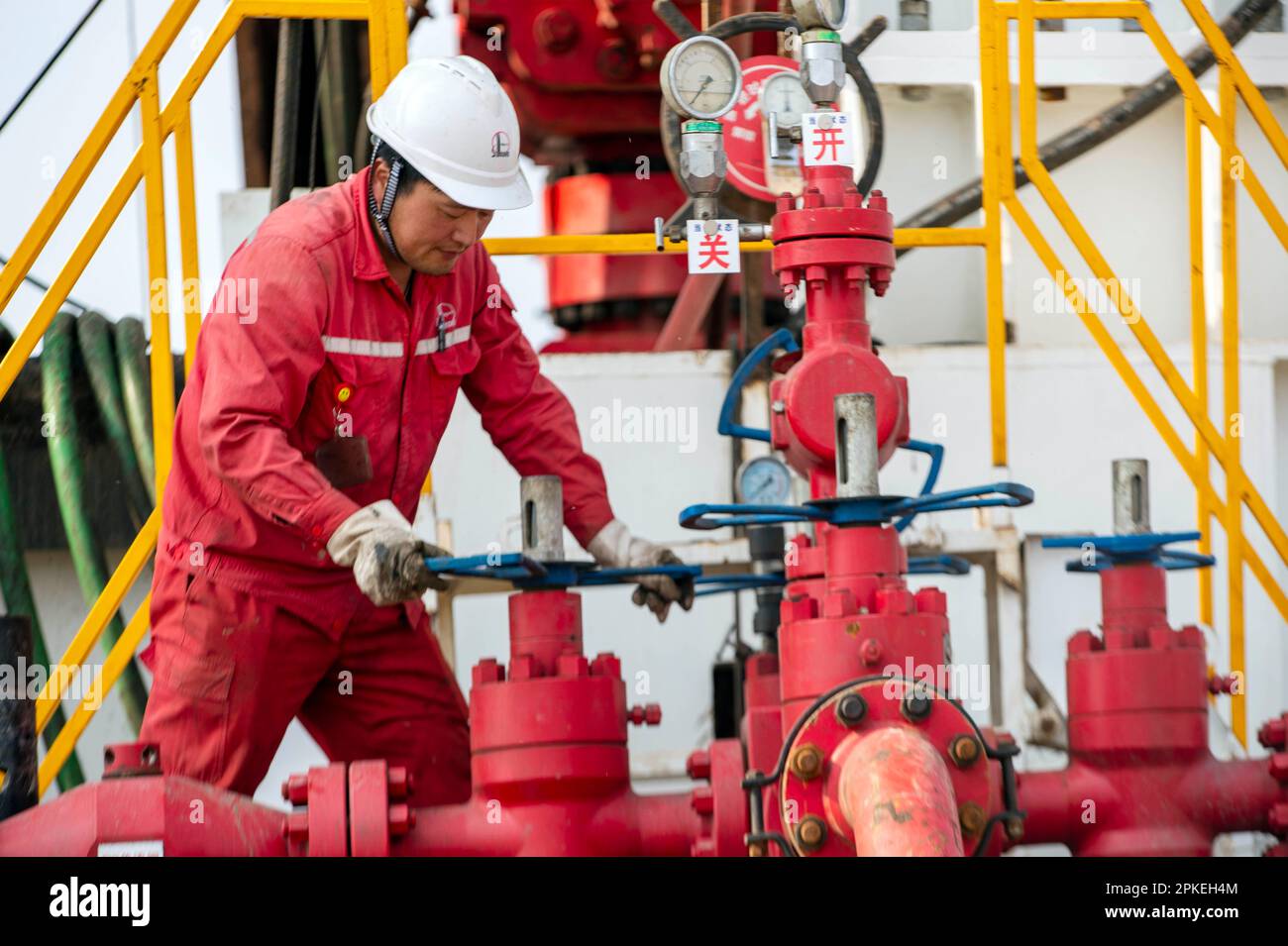 TAIZHOU, CHINA - APRIL 7, 2023 - Drillers work at a shale oil well site ...