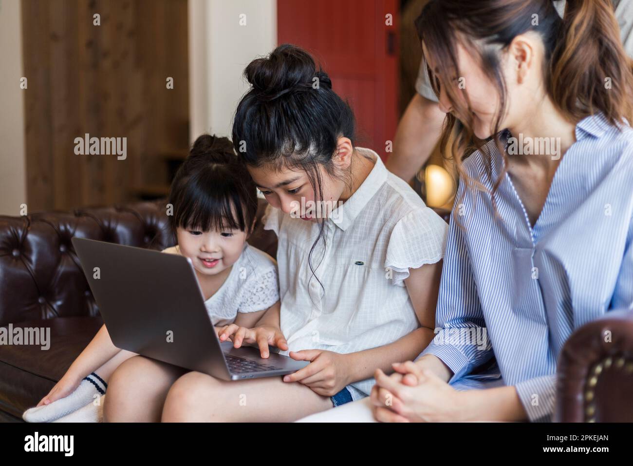 Sister computer hi-res stock photography and images - Alamy