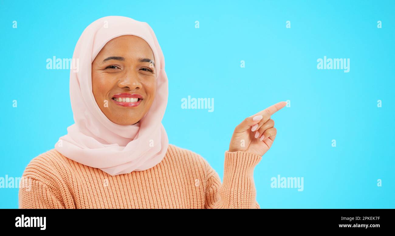 Muslim woman, happy and portrait pointing finger at space for mockup ... Muslim woman, happy and portrait pointing finger at space for mockup ...