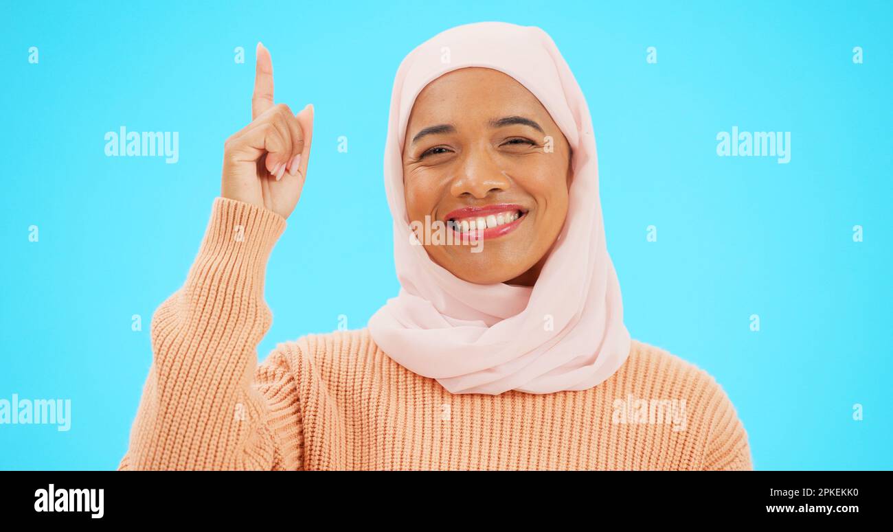 Happy muslim, woman and pointing finger portrait with space for mockup ...