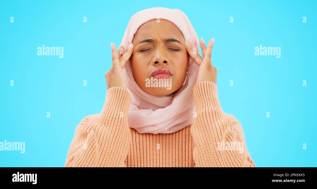 Muslim woman, headache and pain in studio for depression, stress and ...