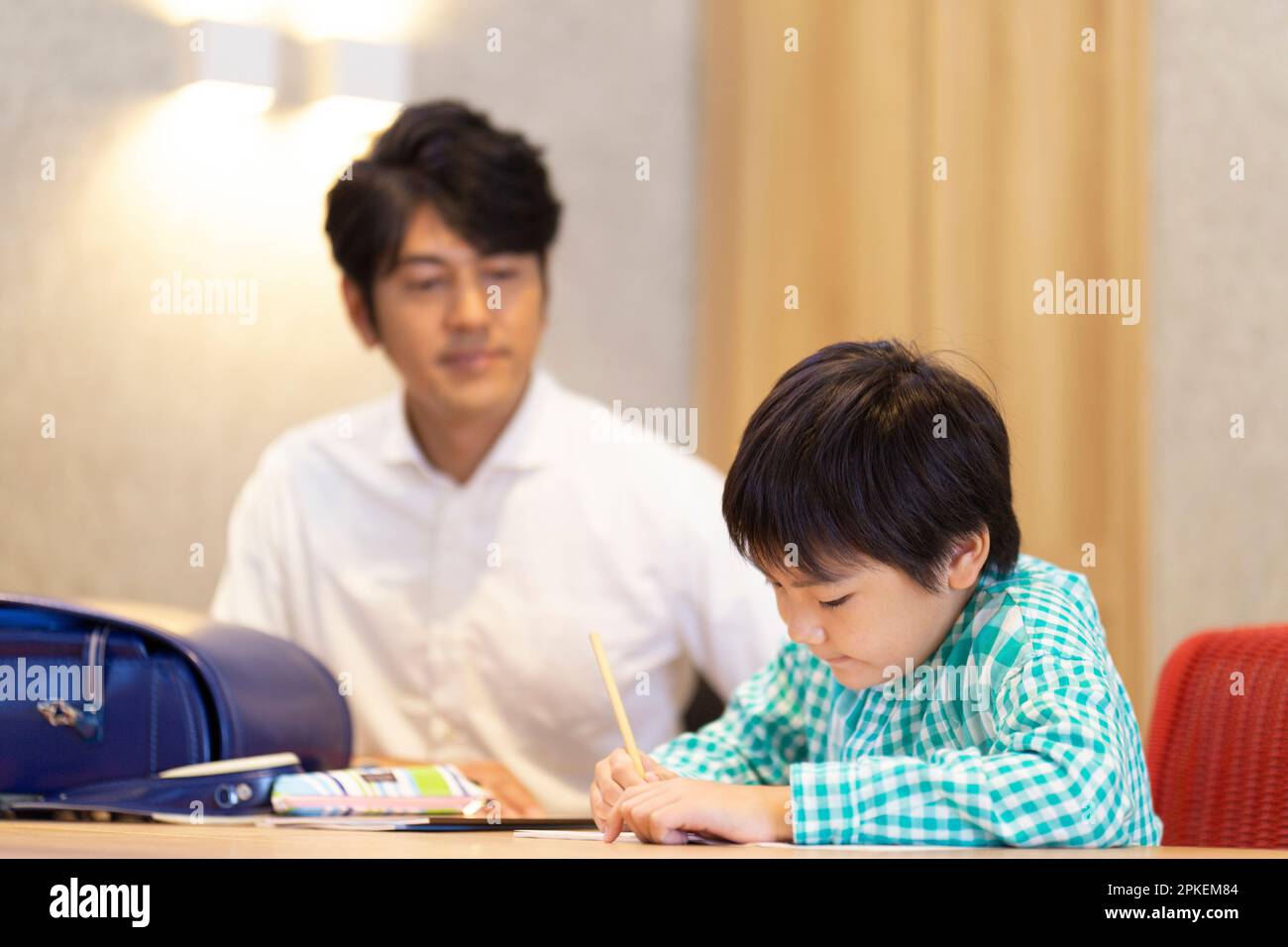 Boys studying at home Stock Photo - Alamy